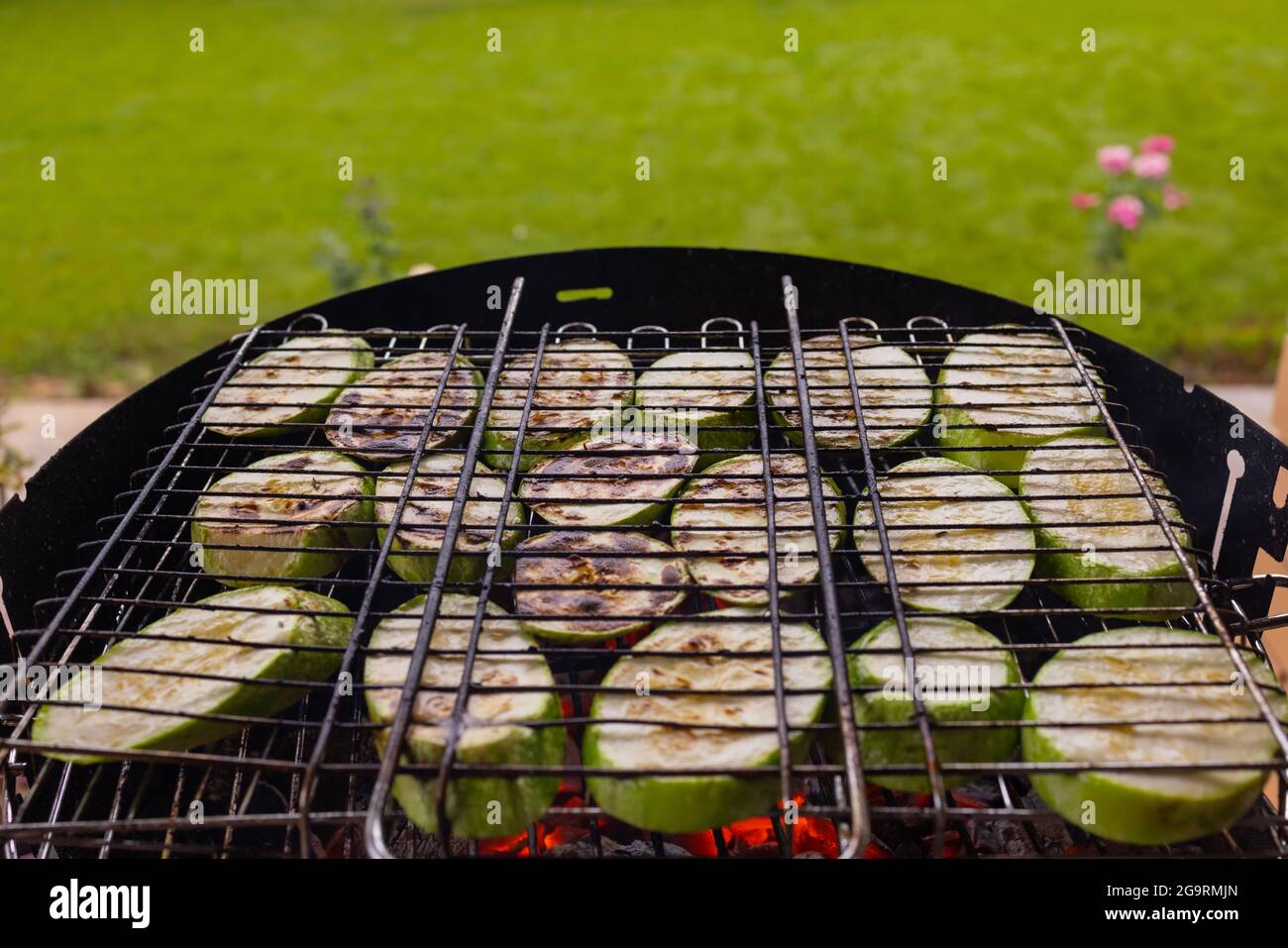 Grilled vegetables are baked to prepare an Oriental dish. Peppers ...