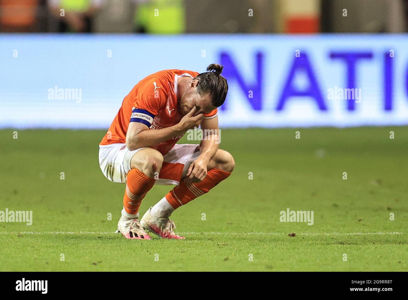 Blackpool, UK. 27th July, 2021. James Husband of Blackpool crouches ...