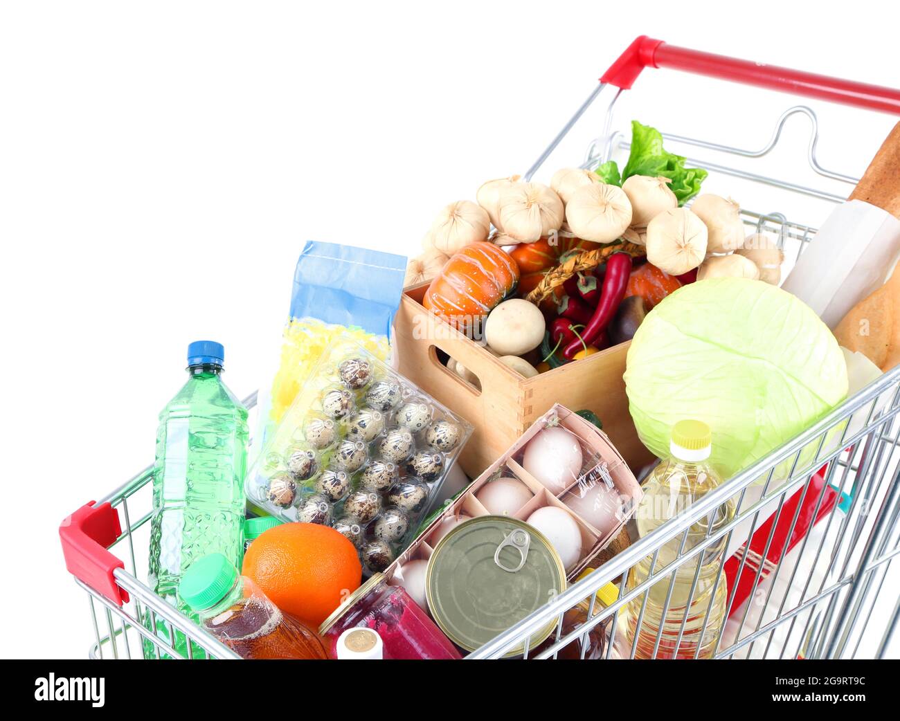 Shopping cart full with various groceries isolated on white Stock Photo ...