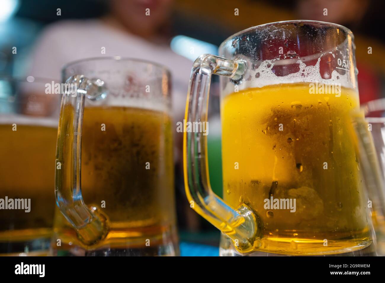 Two cups of beer in a pub in New Zealand. Concept photo of drinking ...