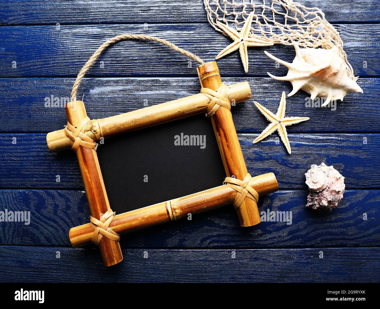 Sign board with shell and sea stars on wooden background Stock Photo ...