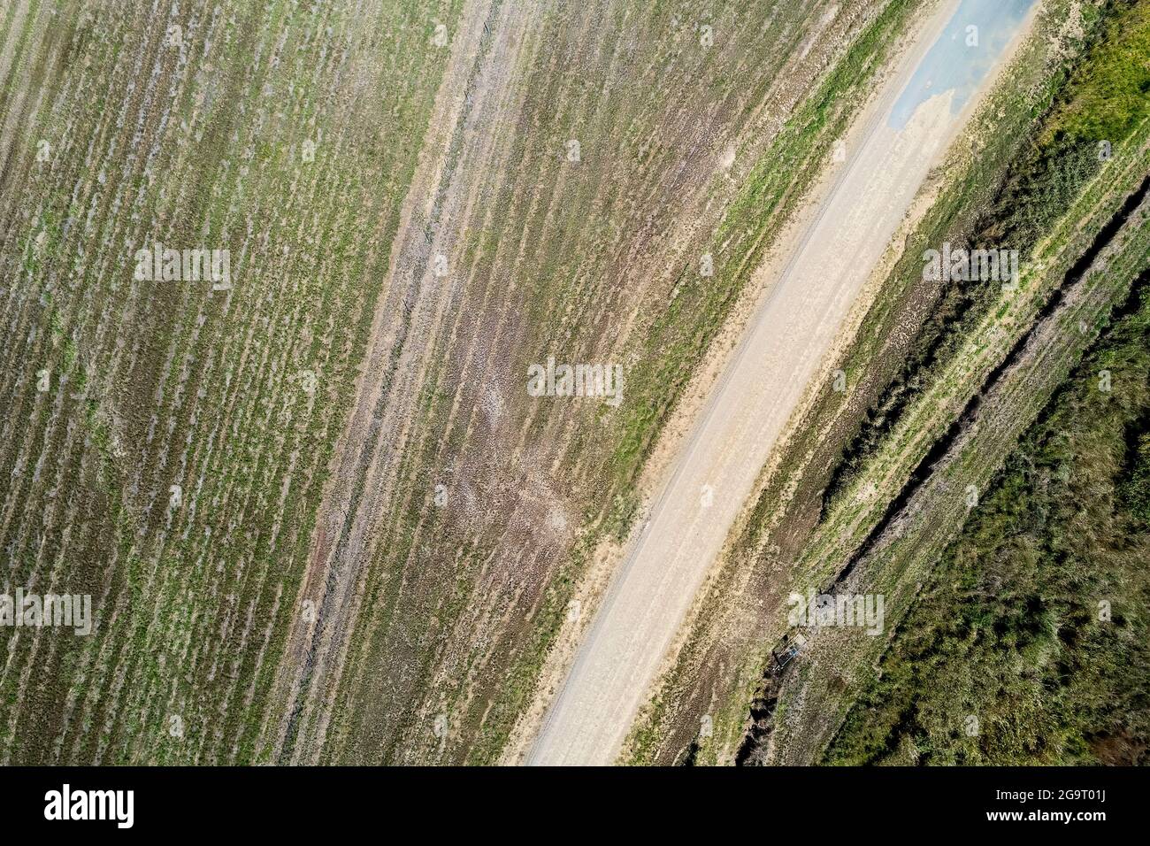 Aerial pattern showing a road through textured landscape Stock Photo ...