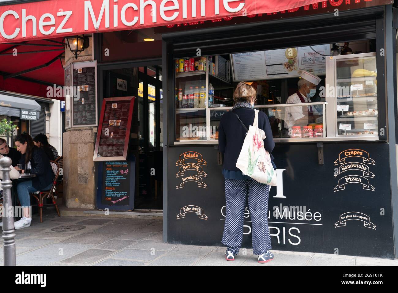 Unidentified random Parisian people and locations in the streets of ...