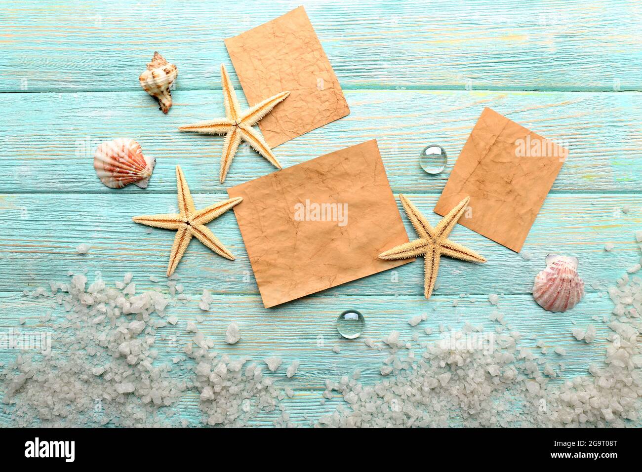 Card blanks with sea stars and shells on wooden background Stock Photo ...