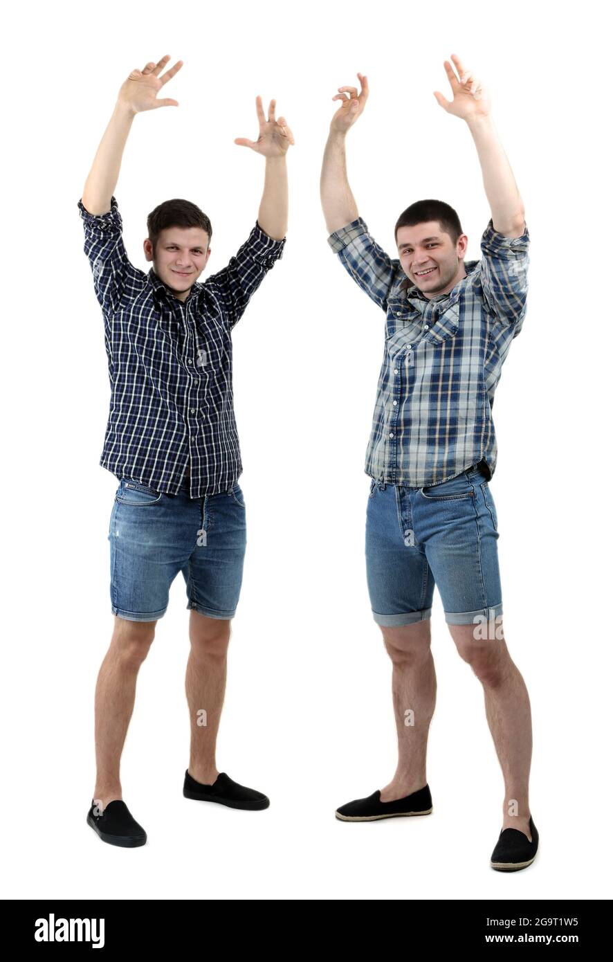 Two handsome young men isolated on white Stock Photo - Alamy