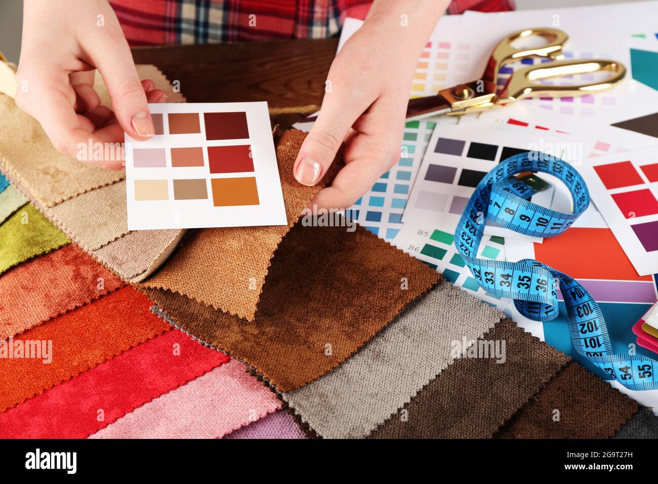 Woman working with scraps of colored tissue and palette close up Stock ...