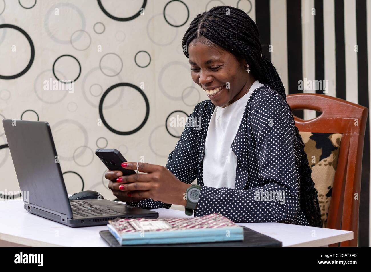 beautiful accountant using her cellphone to connect to people around ...