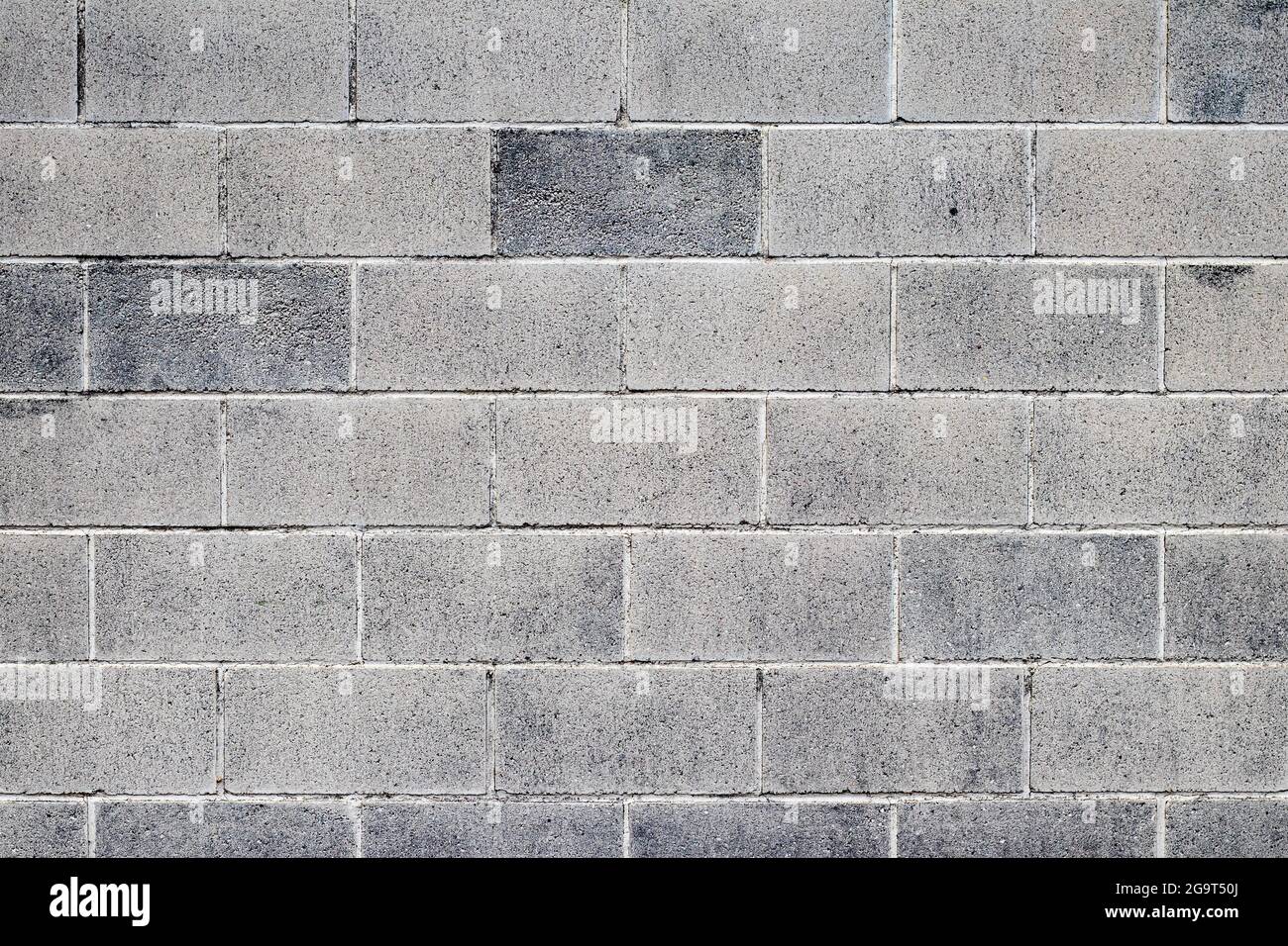 Closeup shot of a grey brick wall wallpaper Stock Photo - Alamy