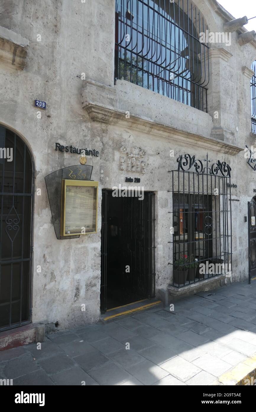 Restaurant in Peru stone railings rail metal black painted door bar bar ...