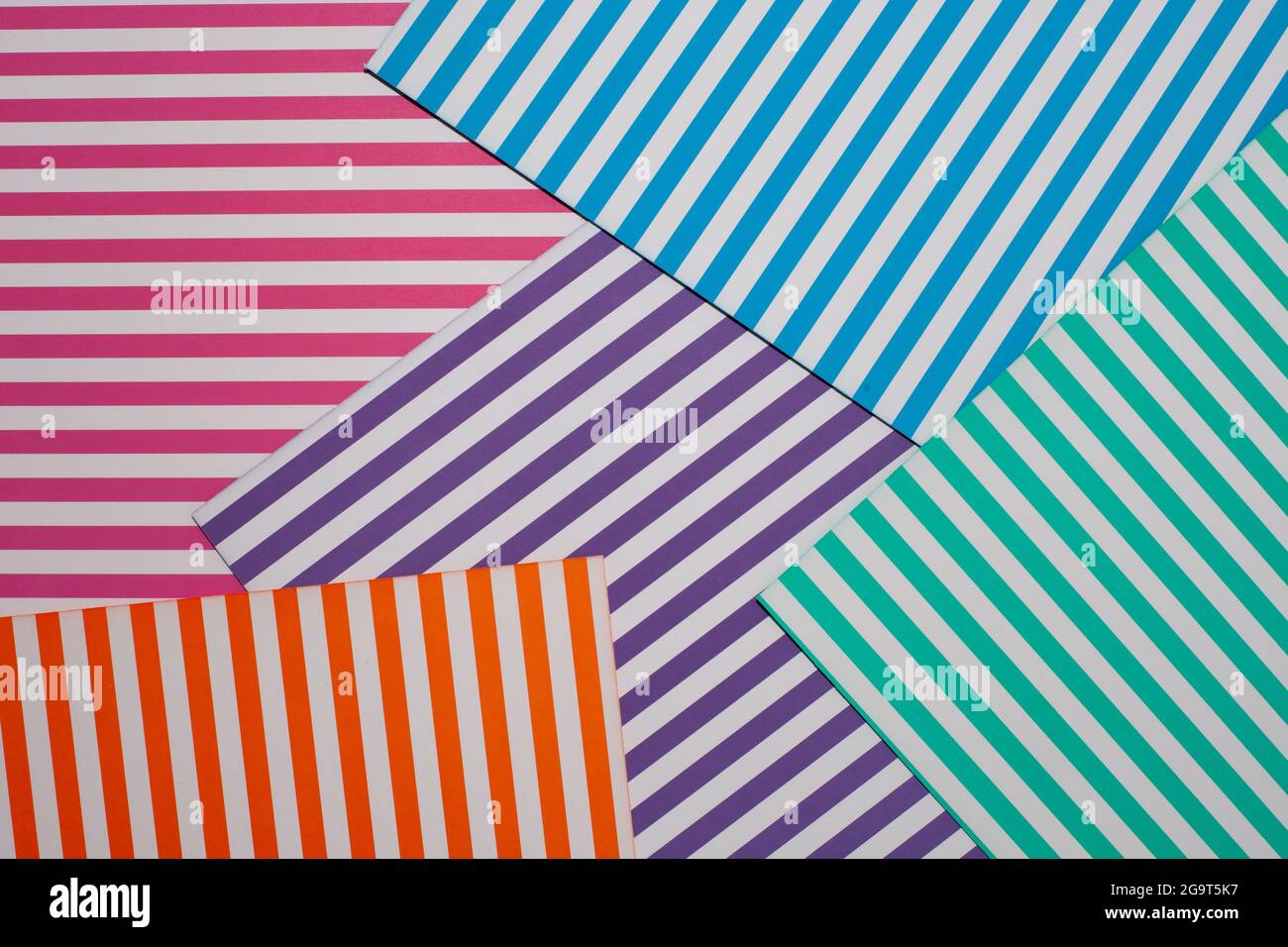 Geometric striped background. A modern, trendy multi-colored background ...