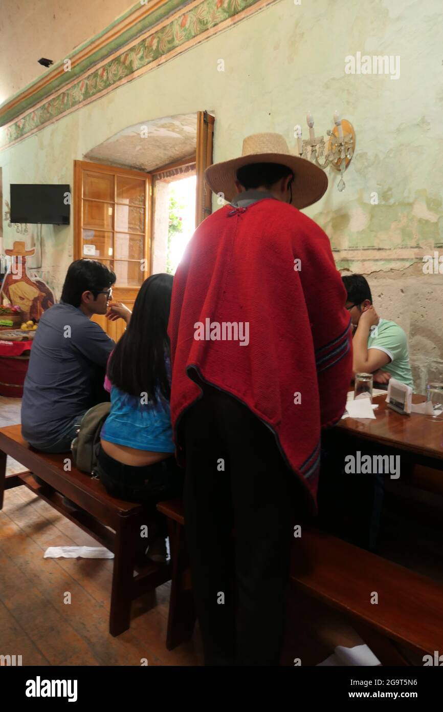 Waiter in a red cape in Peru Restaurant called Victoria in Arequipa ...