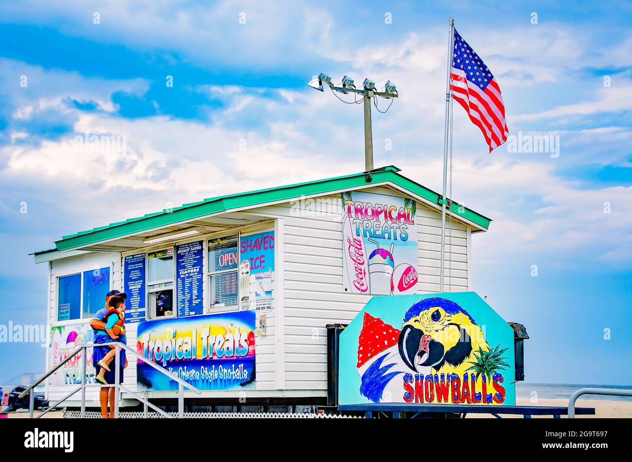 Customers wait in line at Tropical Treats snow cone stand, July 24 ...