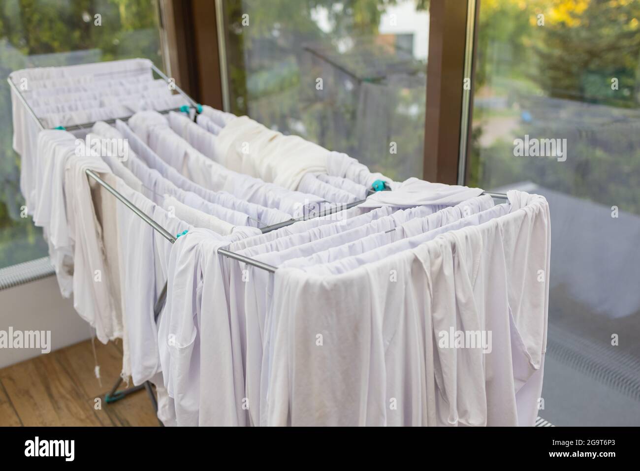 Laundry Drying clothes outdoors with Sun at the Balcony condominium ...