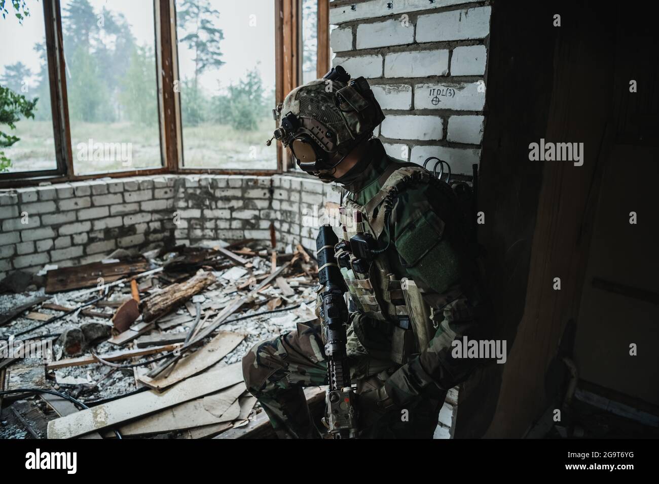 Soldier preparing tactical gear for action battle Stock Photo - Alamy