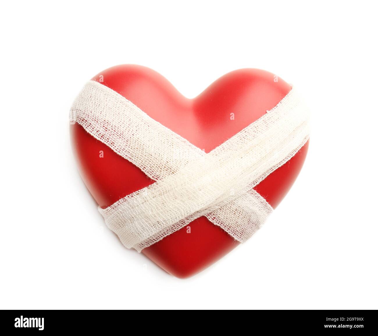 Tied heart with bandage isolated on white Stock Photo - Alamy