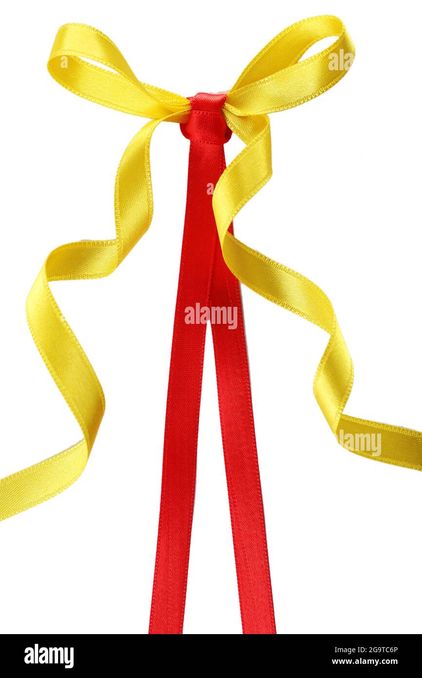 Colorful red and yellow ribbons with bow isolated on white Stock Photo ...
