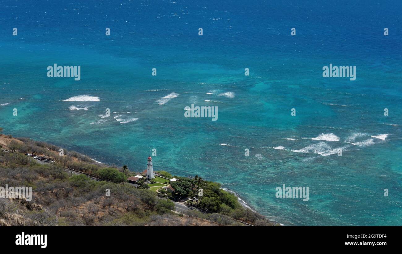 Views of the lonely Diamond Head Lighthouse surrounded by Pacific Ocean ...
