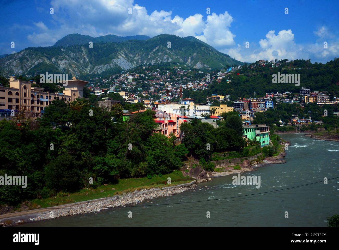 A beautiful view of mountains houses along the Neelam River have huge ...