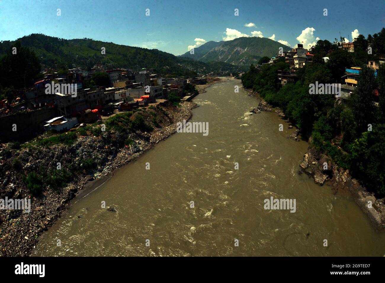 A beautiful view of mountains houses along the Neelam River have huge ...