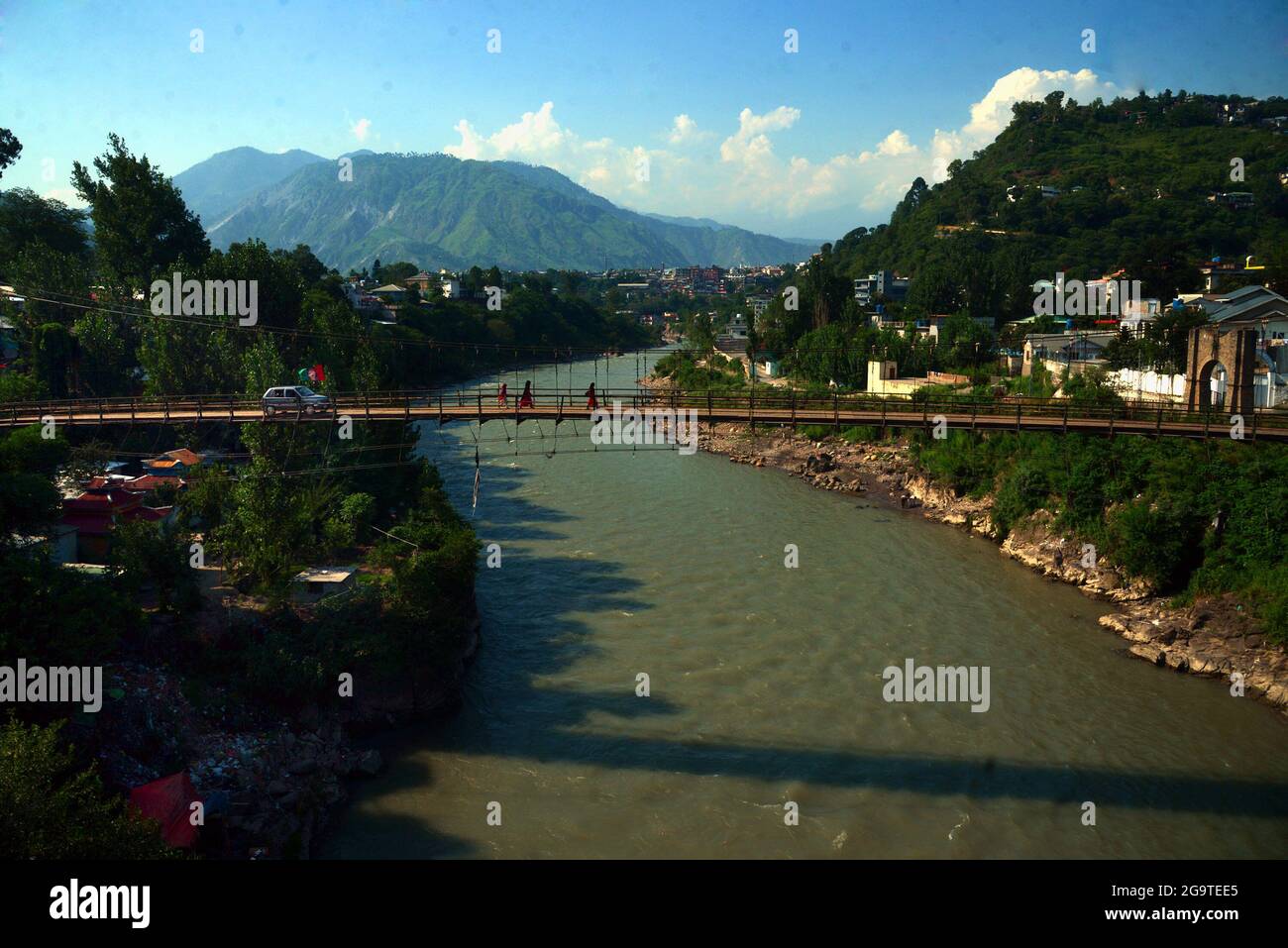 A beautiful view of mountains houses along the Neelam River have huge ...