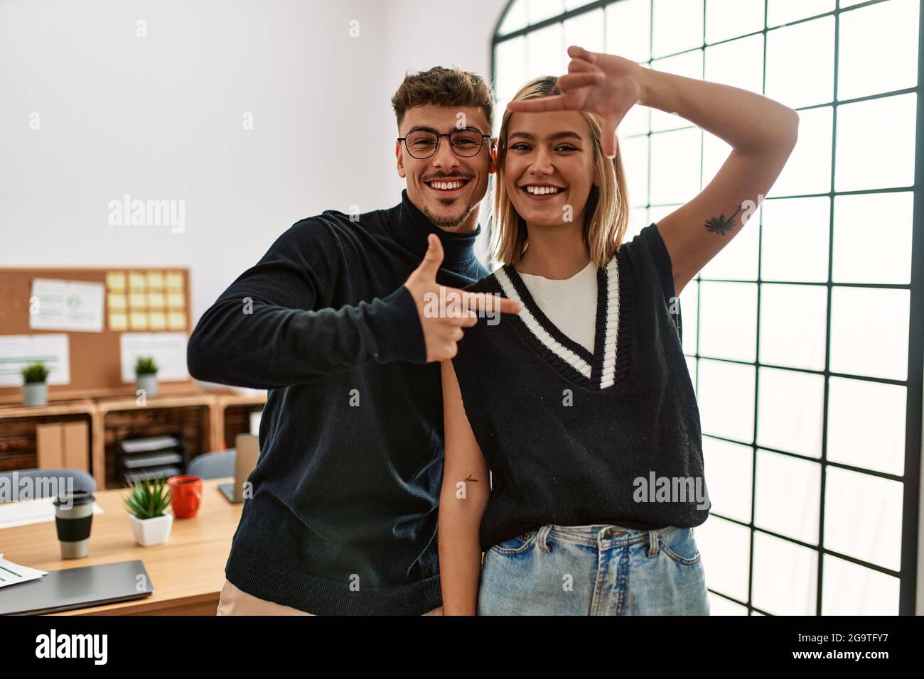 Two beautiful business workers wearing business style standing at the ...