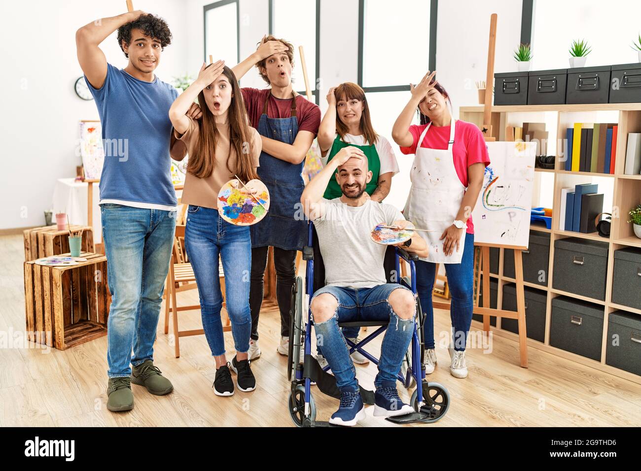 Group of young artists people at art studio stressed and frustrated ...