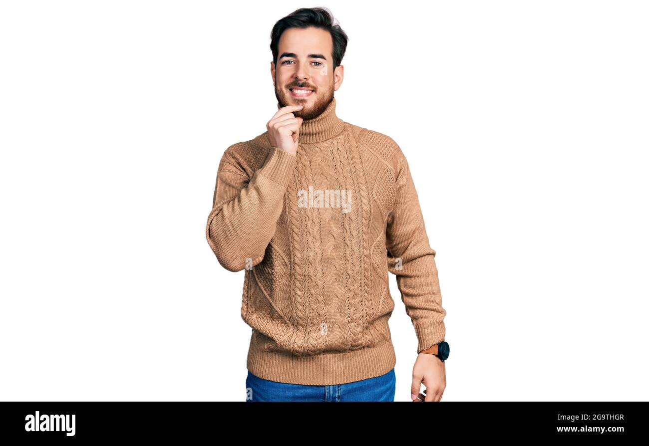 Young hispanic man wearing casual clothes looking confident at the ...