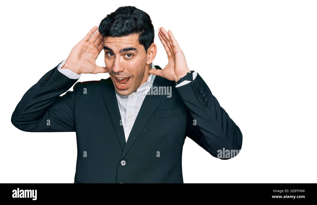 Handsome hispanic man wearing business clothes smiling cheerful playing ...