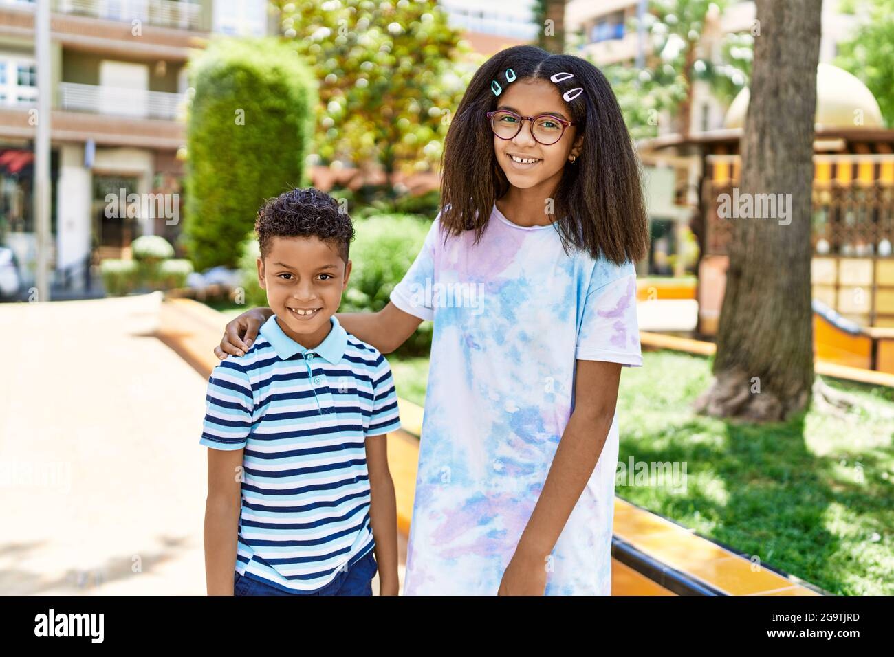 African american brother and sister smiling happy outdoors. Black ...