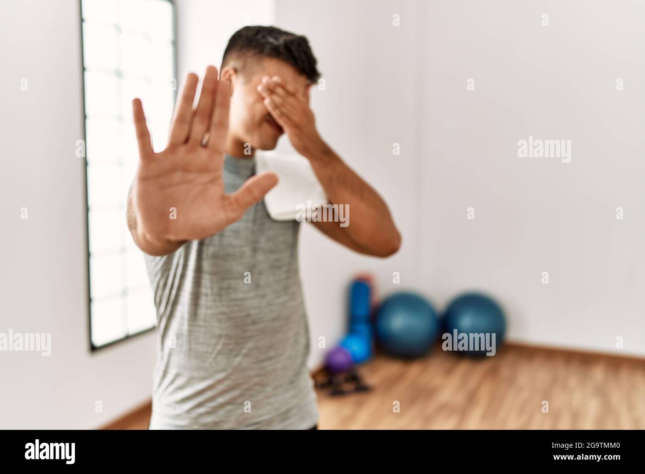Man towel embarrassed hi-res stock photography and images - Alamy