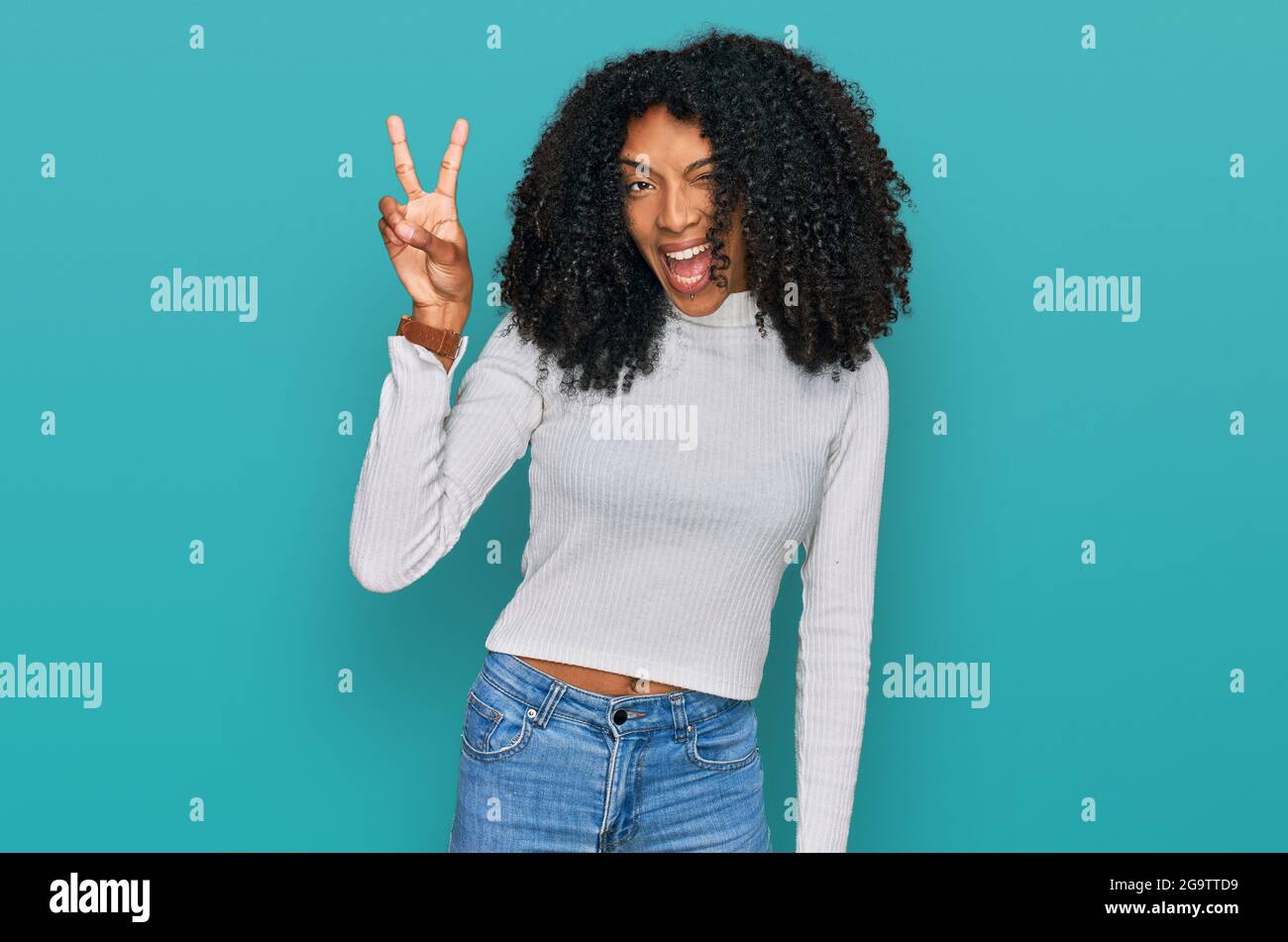 Young african american girl wearing casual clothes smiling with happy ...