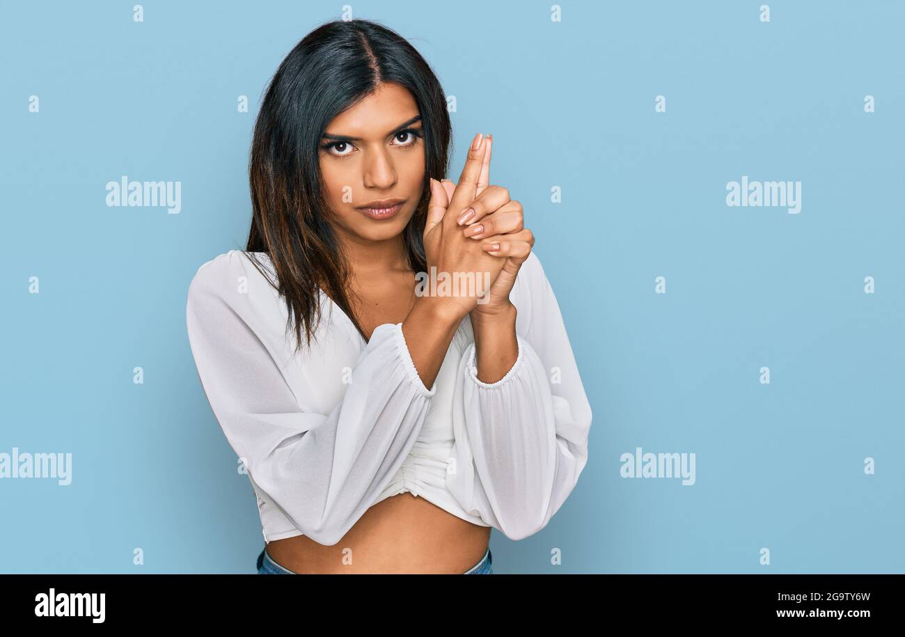 Young latin transsexual transgender woman wearing casual clothes ...