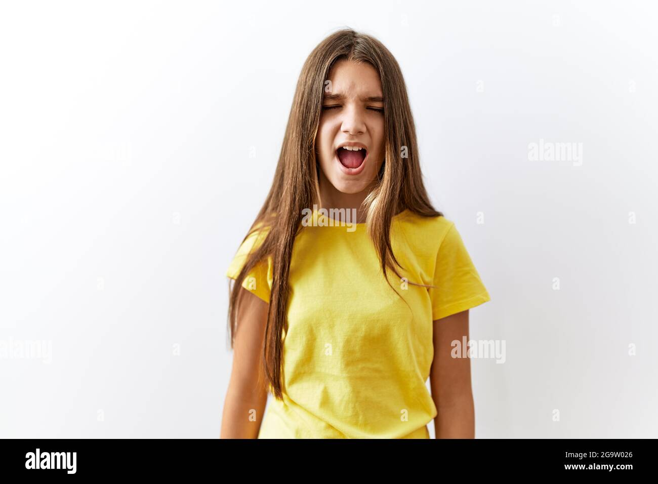 Young brunette teenager standing together over isolated background ...