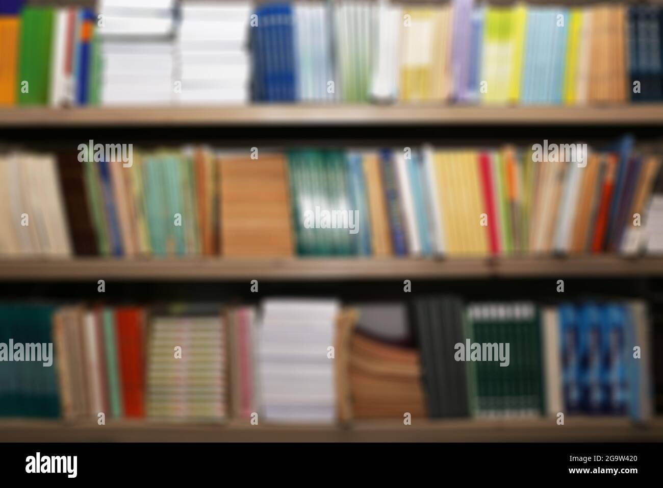 Many books on bookshelf in library Stock Photo - Alamy