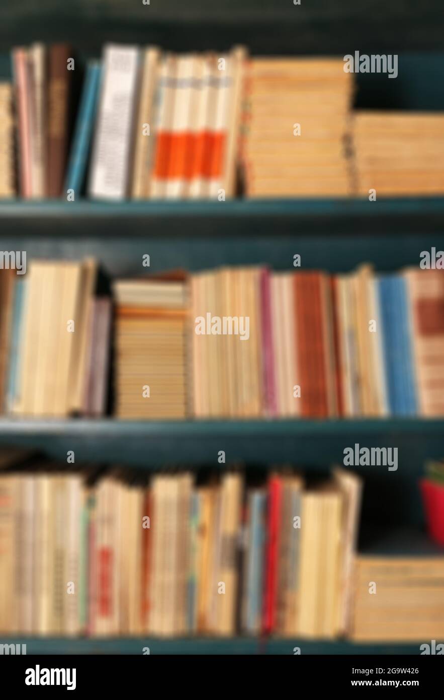 Many books on bookshelf in library Stock Photo - Alamy