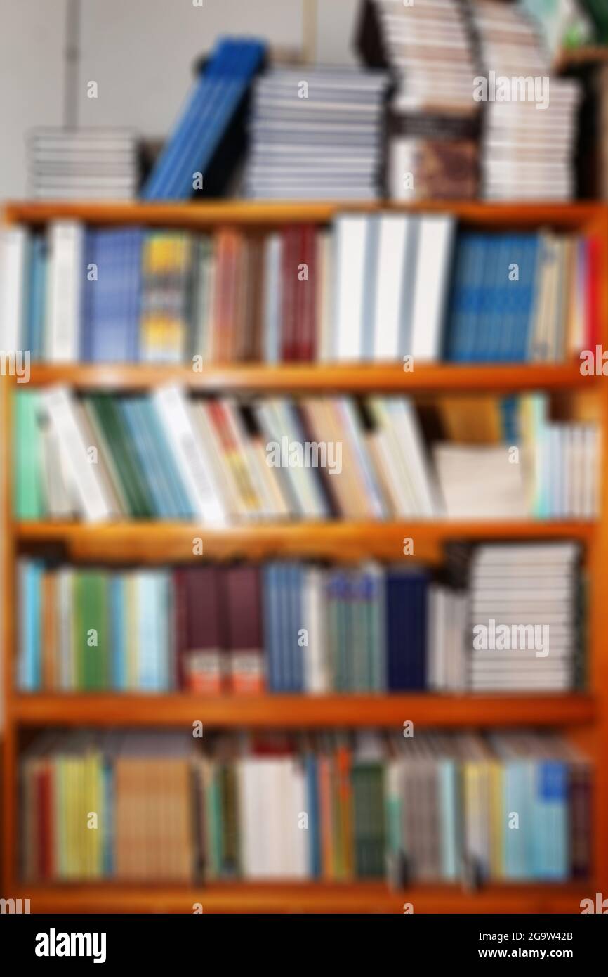 Many books on bookshelf in library Stock Photo - Alamy
