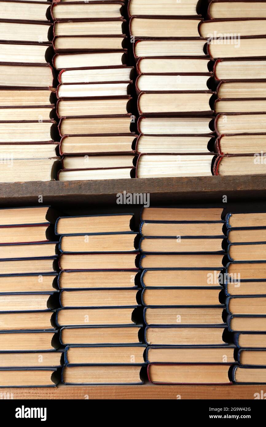 Many books on bookshelf in library Stock Photo - Alamy