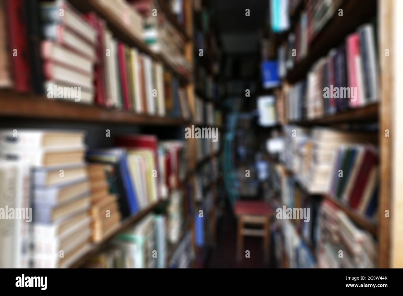 Many books on bookshelf in library Stock Photo - Alamy