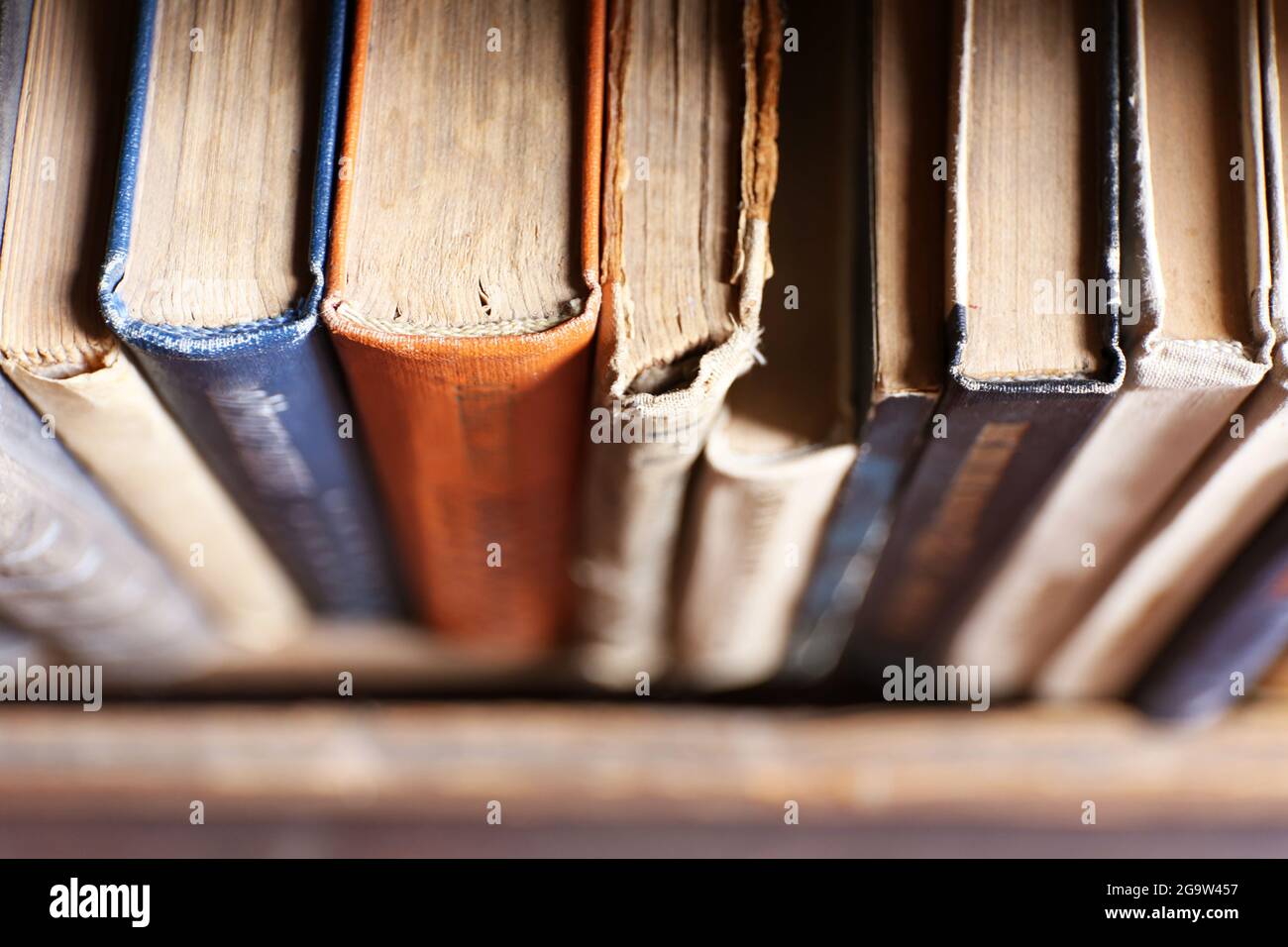 Many books on bookshelf in library Stock Photo - Alamy