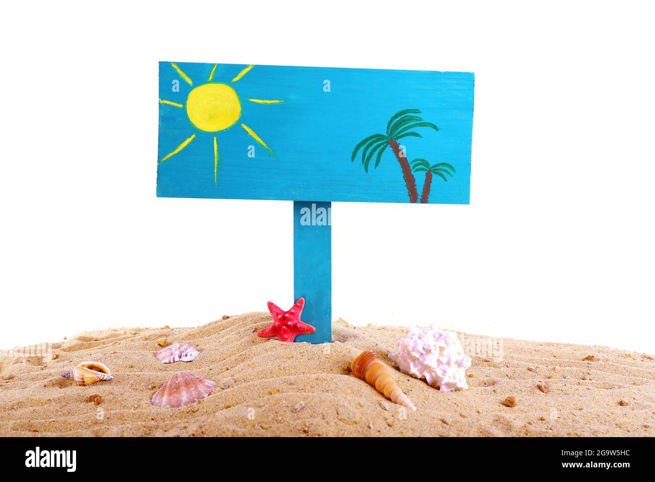 Wooden sign standing in sand isolated on white Stock Photo - Alamy