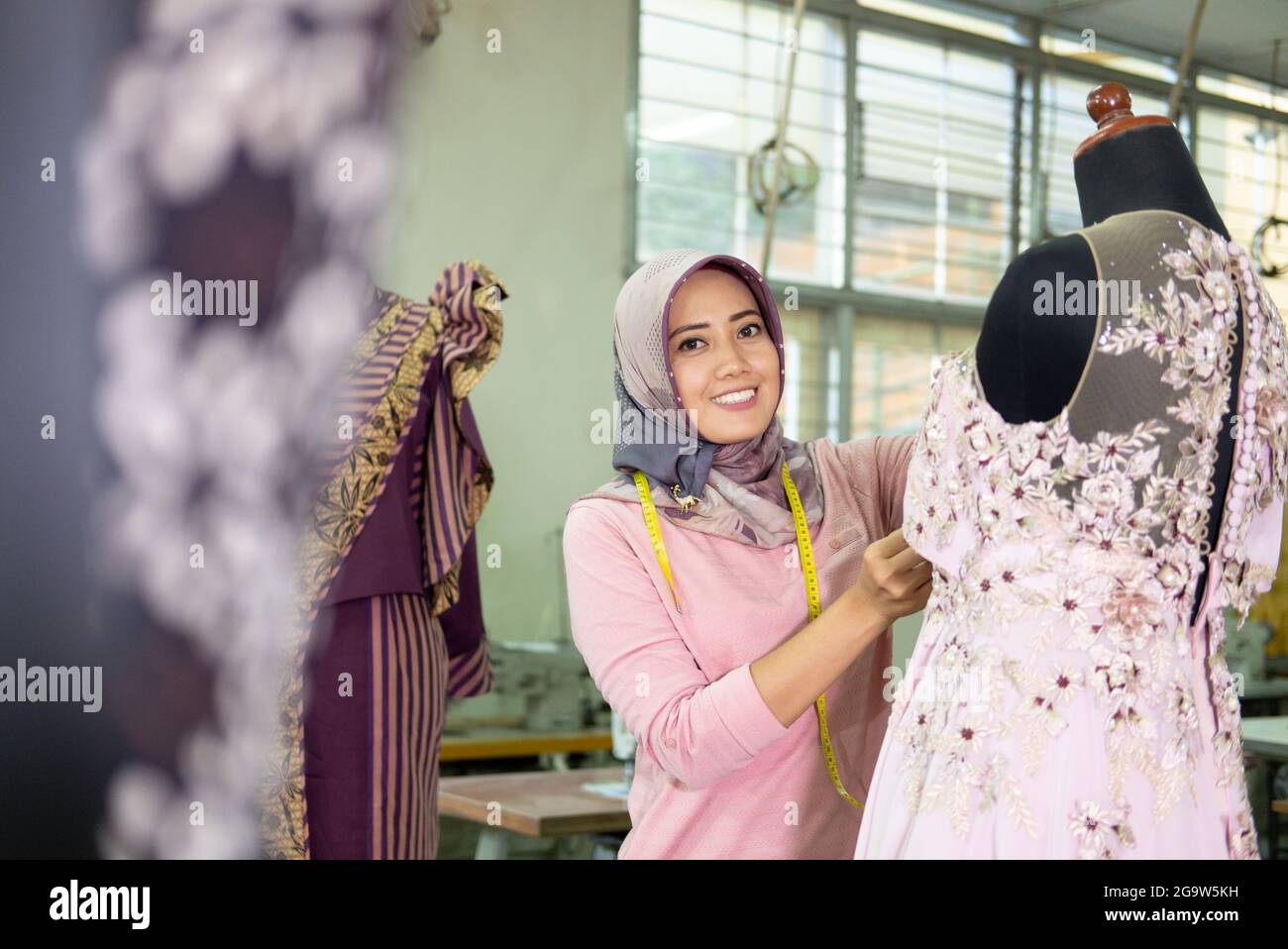 Muslim designer hi-res stock photography and images - Alamy