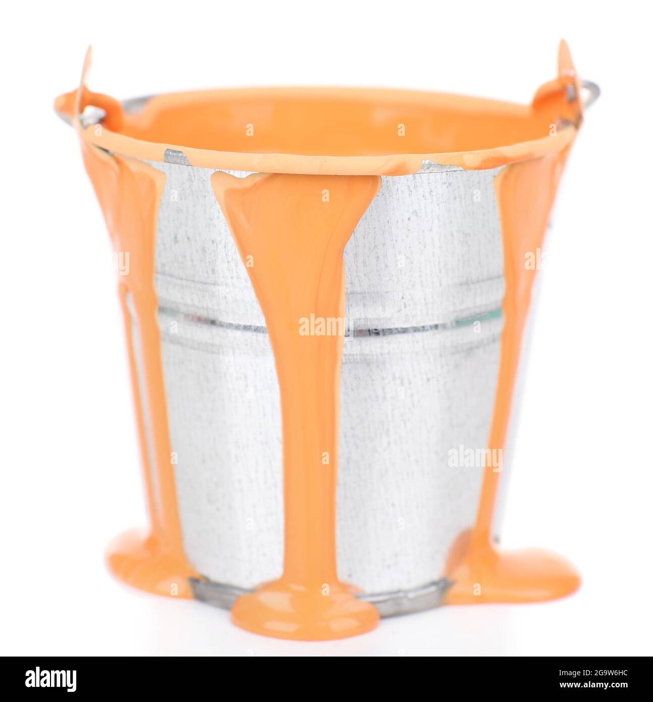 Bucket of orange paint isolated on white Stock Photo - Alamy