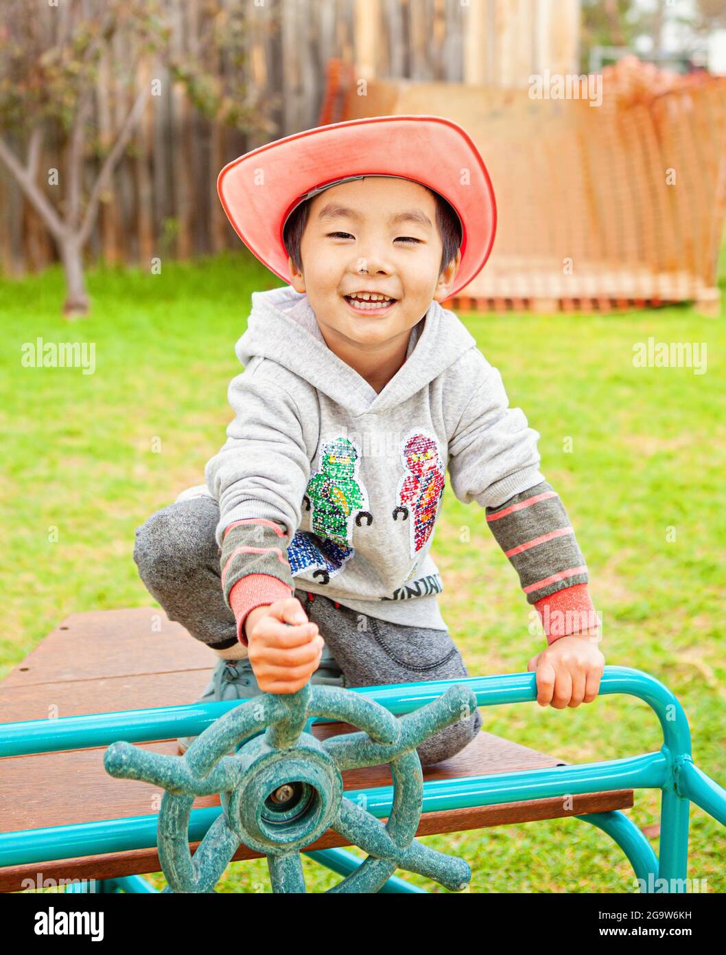 Boy playing outside hi-res stock photography and images - Alamy