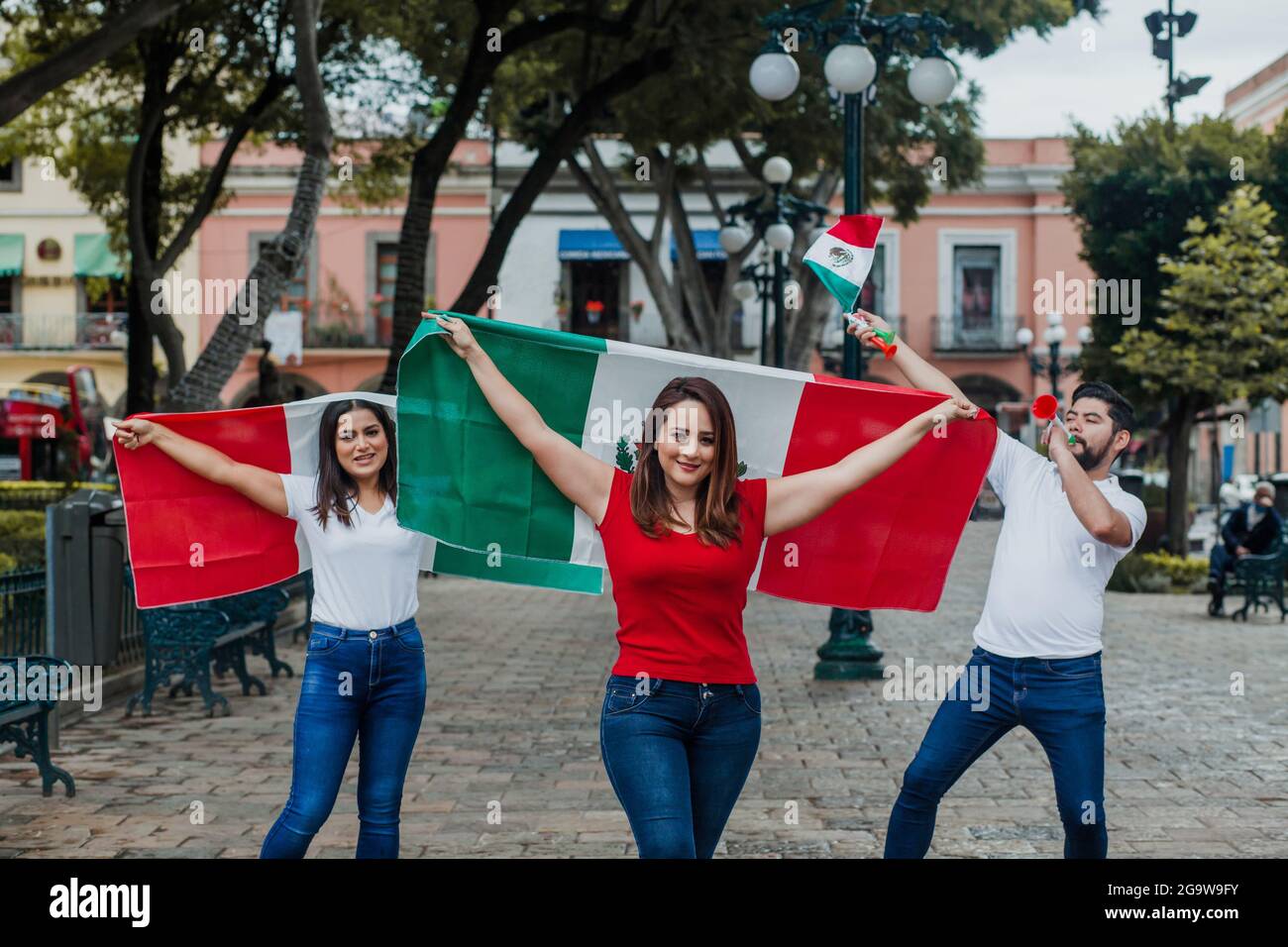 Group of mexican friends celebrating Mexican Independence Day with ...