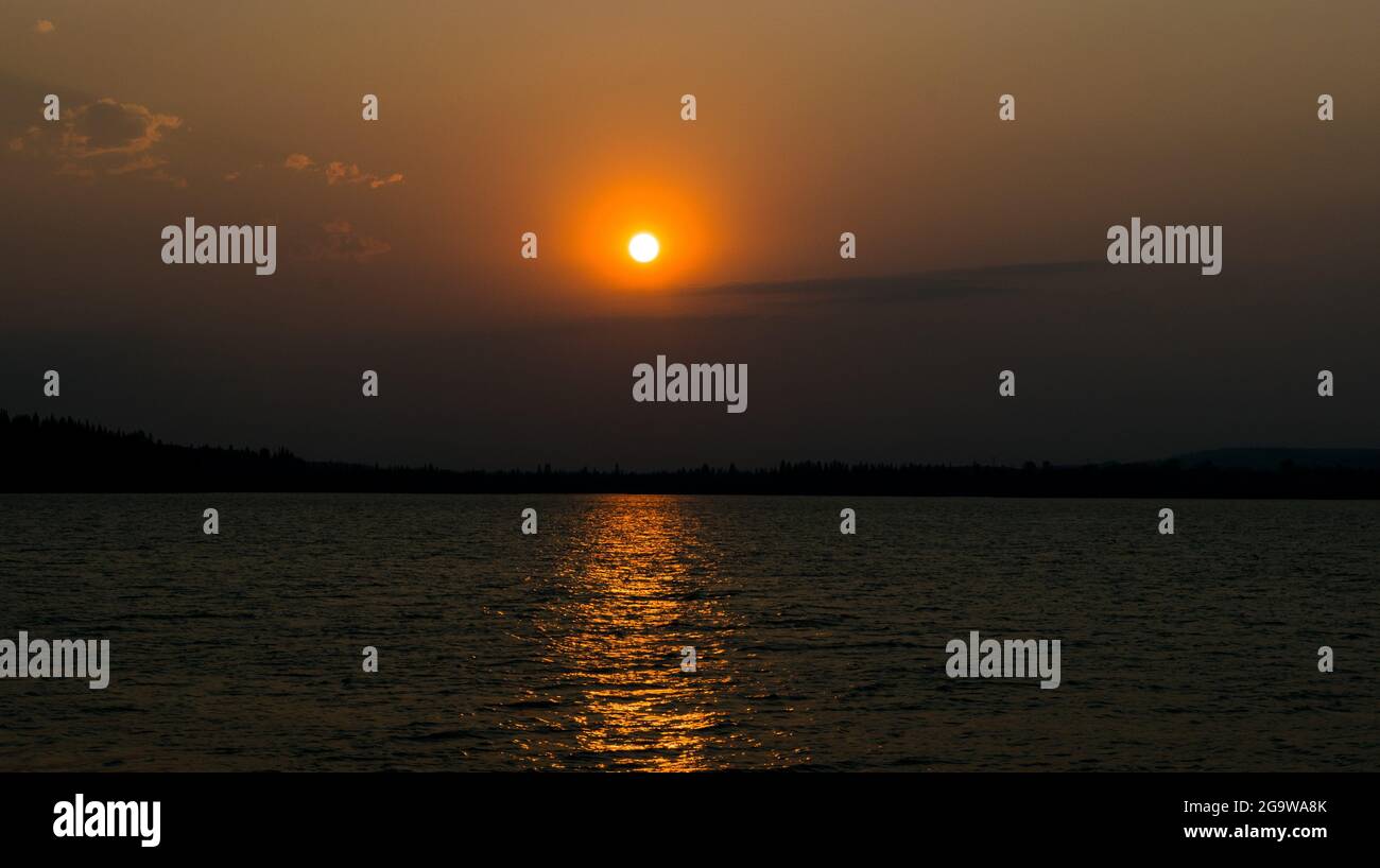 Sunset through smoke filled skies Stock Photo - Alamy