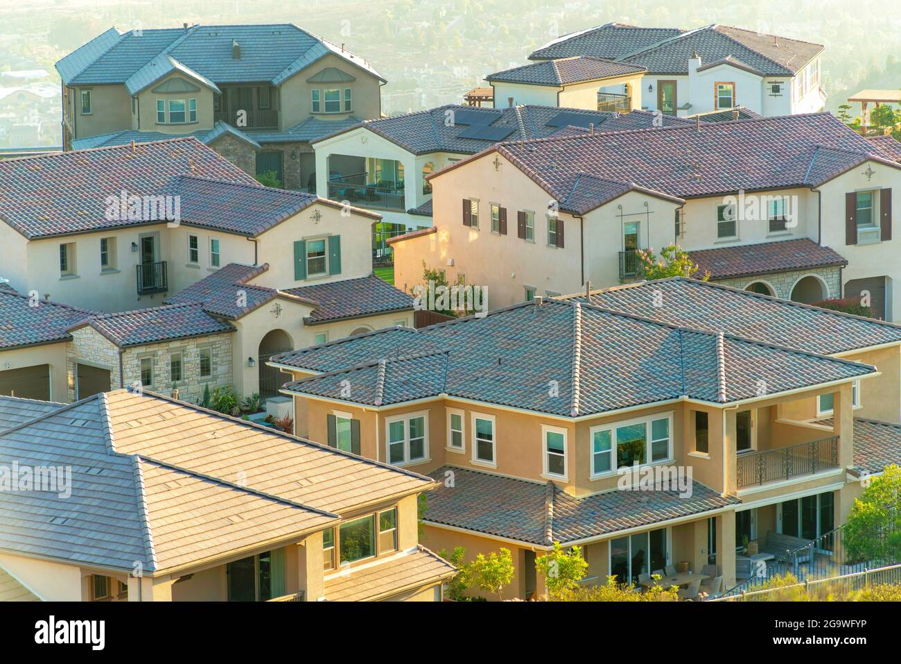 Beautiful summer's day in a town in the countryside with rich houses ...