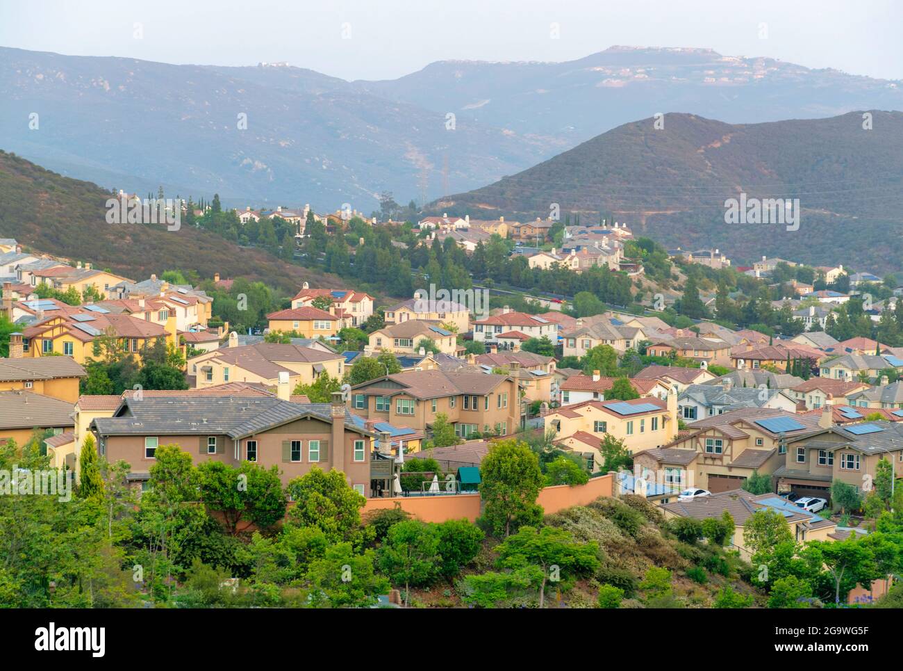 Aerial view of a beautiful rural town with buildings and lush trees on ...