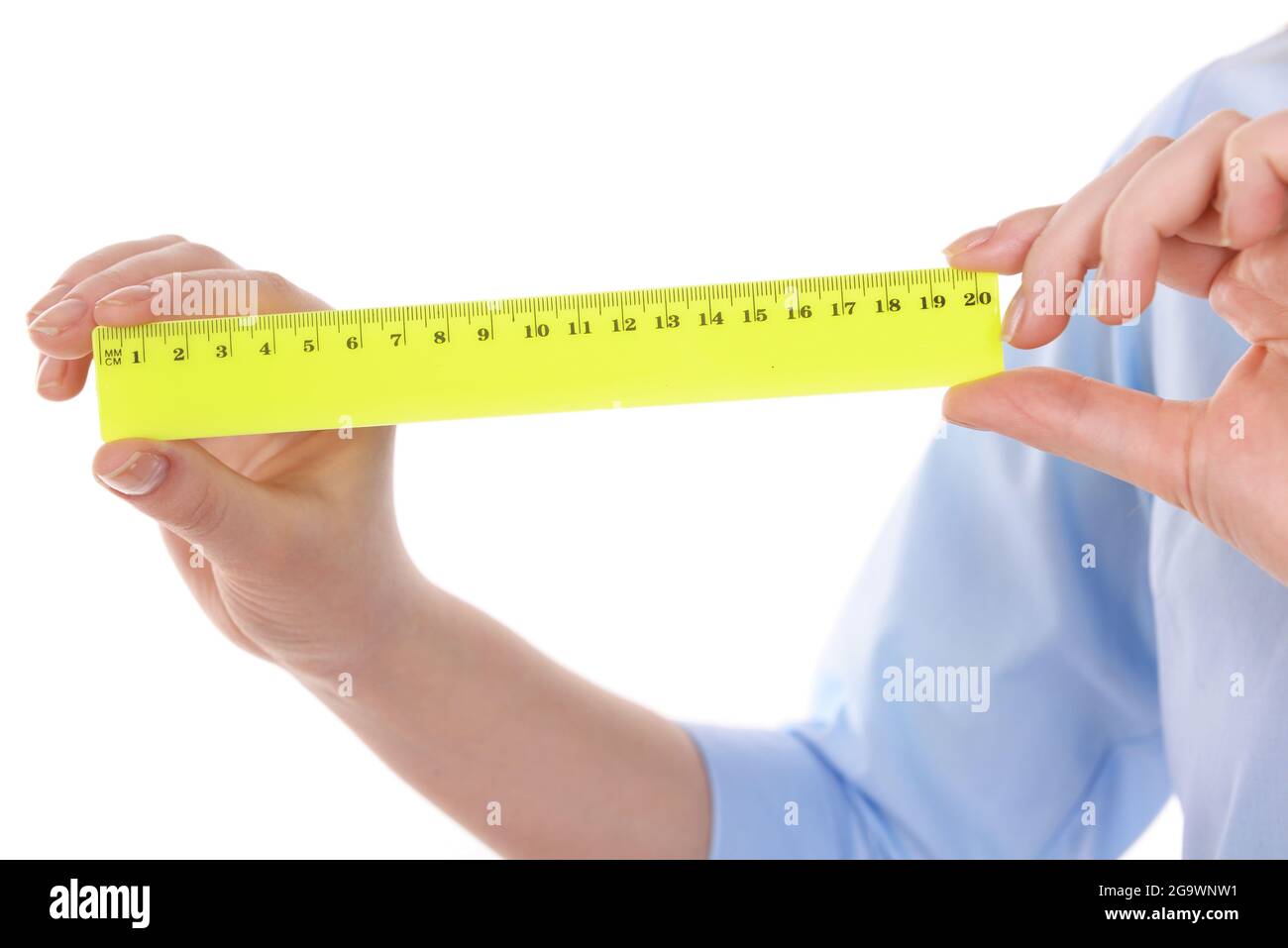 Female hands with plastic ruler isolated on white Stock Photo - Alamy