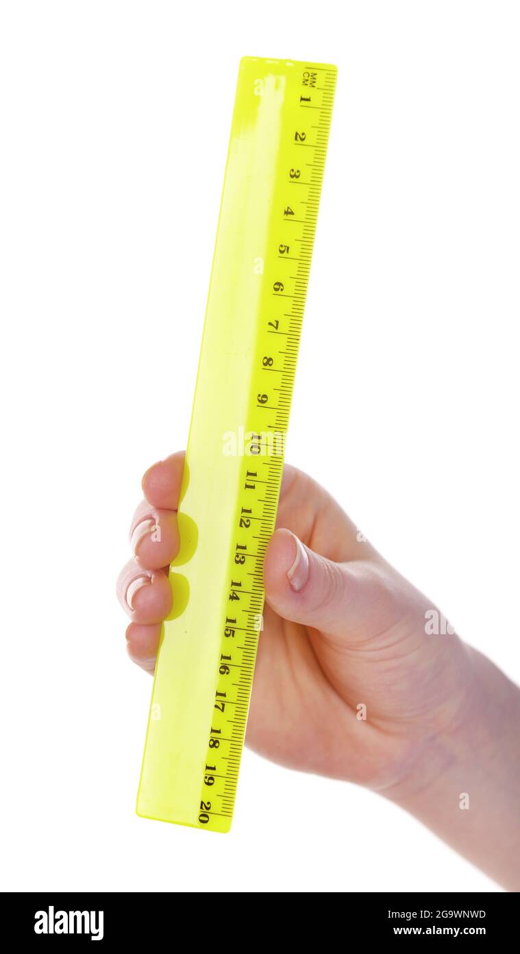 Female hand with plastic ruler isolated on white Stock Photo - Alamy