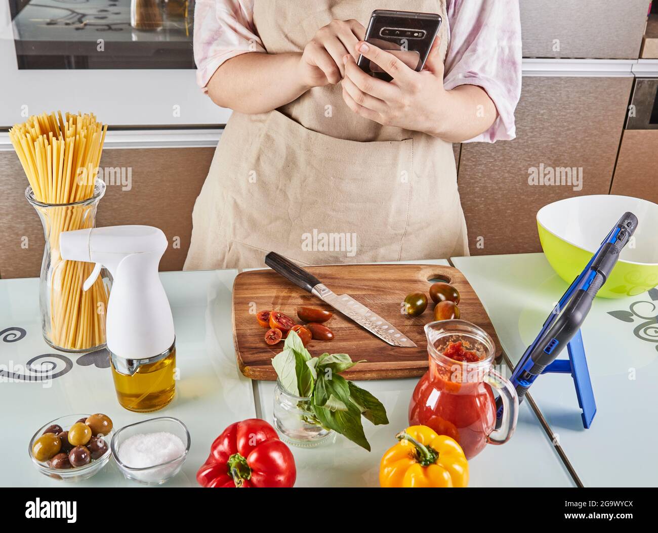 Teen prepares virtual online textbook tutorial and watches digital ...